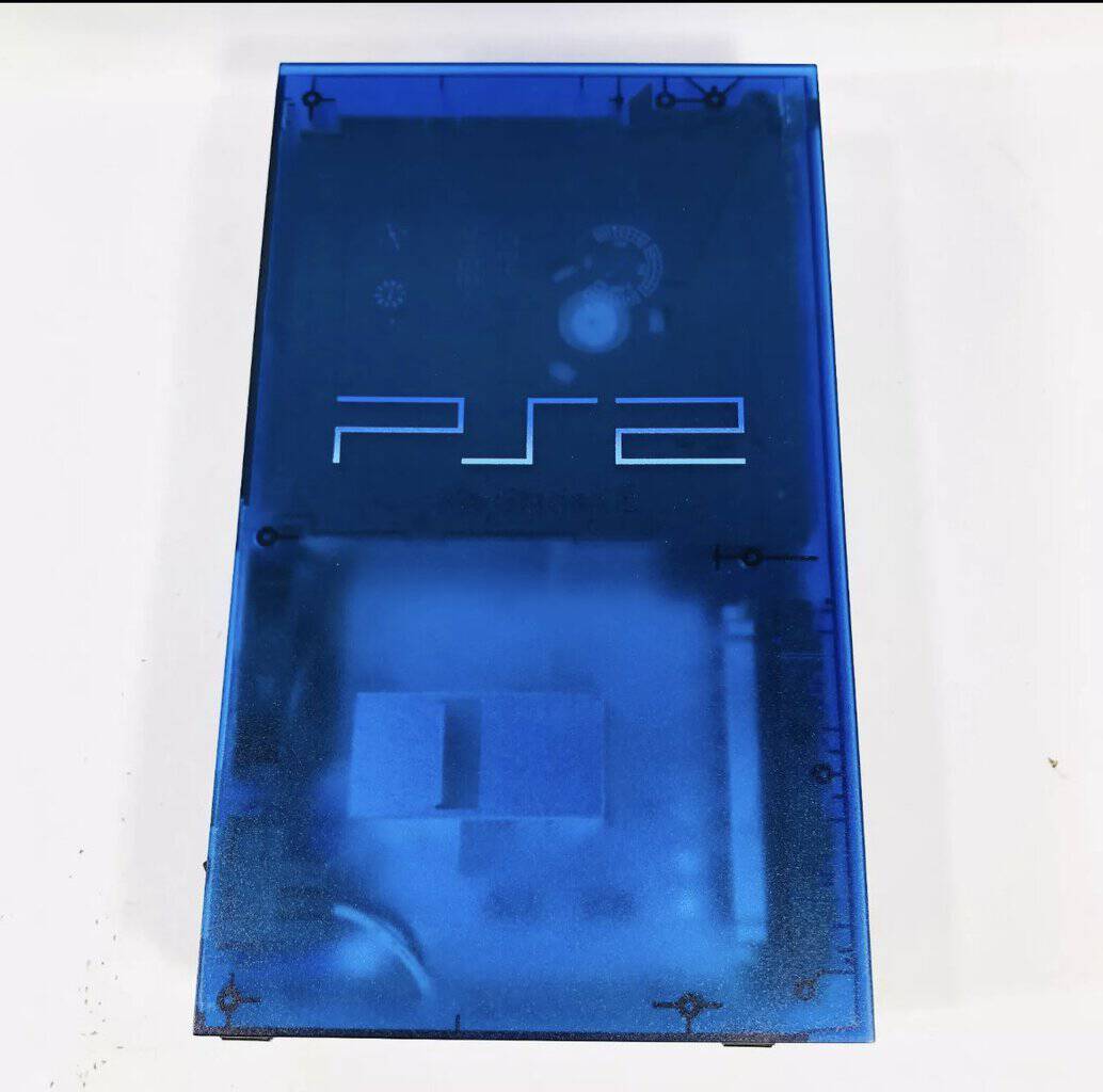 Essa versão translúcida do PS2 é uma das mais bonitas e raras do ...